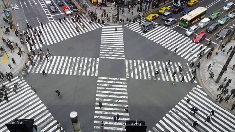 People passing the street crossing in Gi... | Stock Video | Pond5