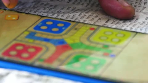 People playing Ludo in a mobile or cell ... | Stock Video | Pond5