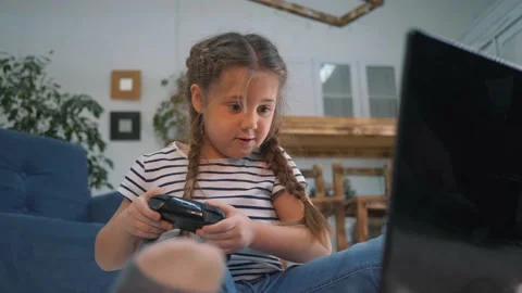People playing video games. Happy cute k... | Stock Video | Pond5