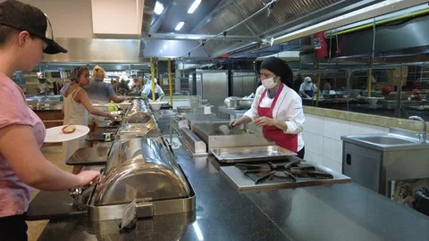 People put food on their plates. Buffet ... | Stock Video | Pond5