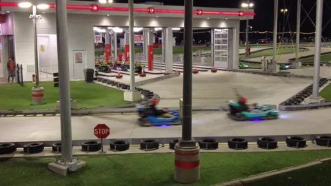 People Racing Around Track In Go Karts A... | Stock Video | Pond5
