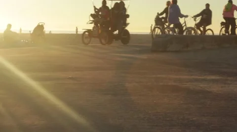 People Riding Bike on the Beach, Slow Mo... | Stock Video | Pond5