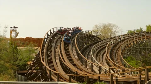 People riding the Stampida roller coaste... | Stock Video | Pond5