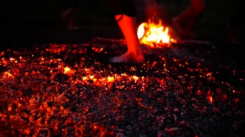 people running barefoot on fire | Stock Video | Pond5