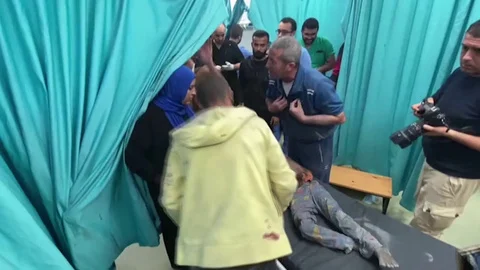 People rush to hospital following Israel... | Stock Video | Pond5
