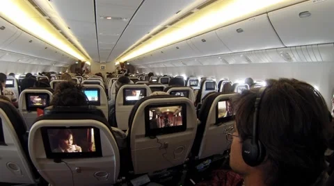 People in salon of plane during the flig... | Stock Video | Pond5