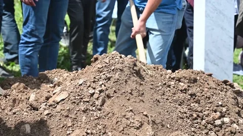 Dirt Pile With Shovel