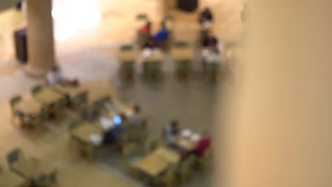 People Sitting Down on Tables at Food Co... | Stock Video | Pond5