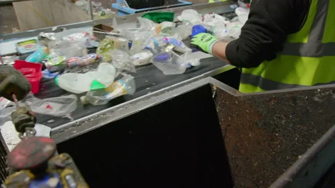 People sorting Plastic Bottles and Alumi... | Stock Video | Pond5