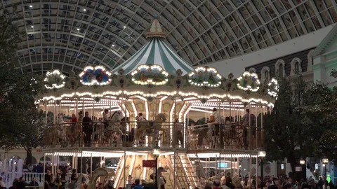 People on spinning carousel at Dream isl... | Stock Video | Pond5