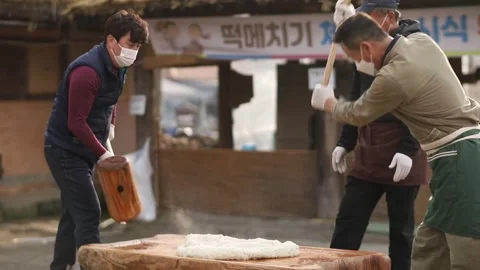 People splitting traditional Korean rice... | Stock Video | Pond5