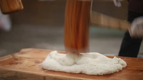 People splitting traditional Korean rice... | Stock Video | Pond5