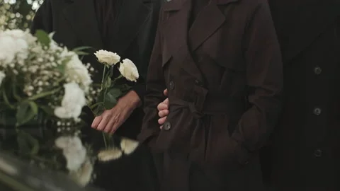 People Standing by Coffin at Outdoor Fun... | Stock Video | Pond5