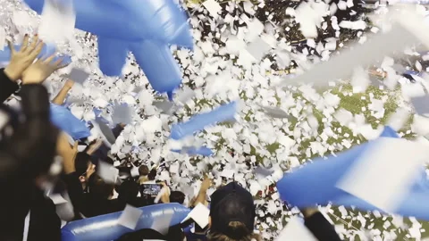 People throwing Papers from a Stadium Tr... | Stock Video | Pond5