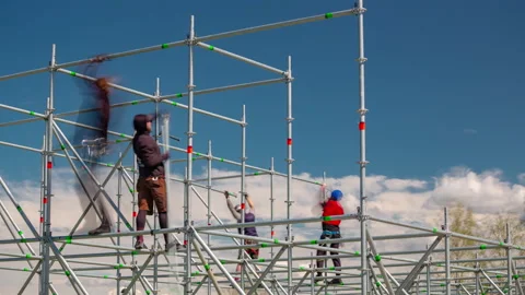 people on top stage framework constructi... | Stock Video | Pond5