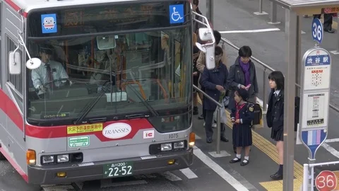 People Waiting at a Bus Stop in Tokyo Ja... | Stock Video | Pond5