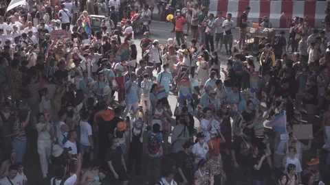 People walk in a parade to kick off Bang... | Stock Video | Pond5