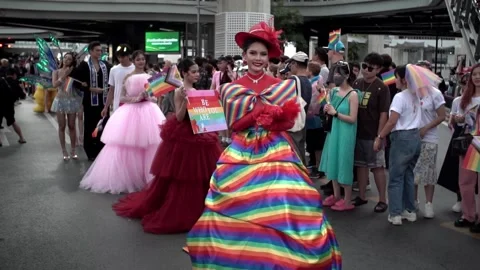 People walk in a parade to kick off Bang... | Stock Video | Pond5