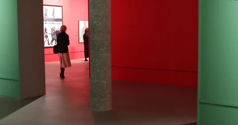 People walk through the art gallery, loo... | Stock Video | Pond5