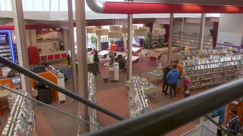 People walking and reading in a library | Stock Video | Pond5