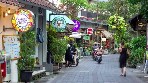 People Walking on Goutama Street in Ubud... | Stock Video | Pond5