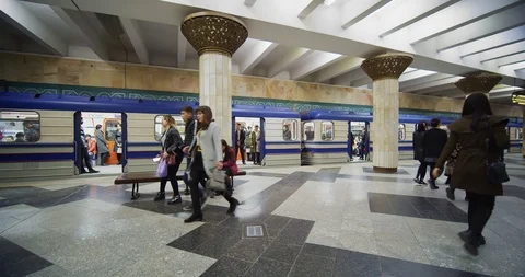 People walking at Pakhtakor metro statio... | Stock Video | Pond5