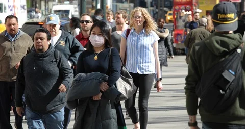 People walking street wearing mask for C... | Stock Video | Pond5