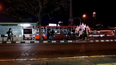 People was waiting bus coming at stop pl... | Stock Video | Pond5
