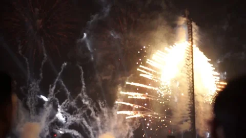 People watch fireworks display | Stock Video | Pond5