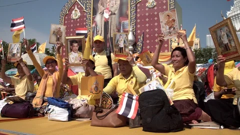 People wear yellow wait for King Maha Va... | Stock Video | Pond5