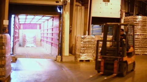 People work on loader machines during lo... | Stock Video | Pond5