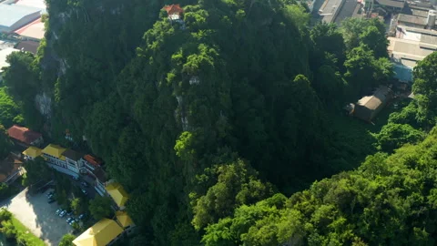Perak Cave Temple and limestone hills ae... | Stock Video | Pond5