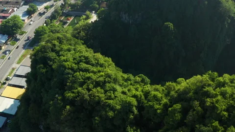 Perak Cave Temple and limestone hills ae... | Stock Video | Pond5