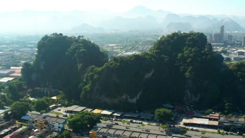 Perak Cave Temple and limestone hills ae... | Stock Video | Pond5