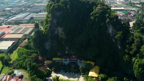 Perak Cave Temple and limestone hills ae... | Stock Video | Pond5