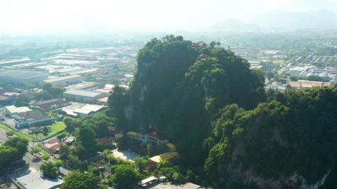 Perak Cave Temple and limestone hills ae... | Stock Video | Pond5