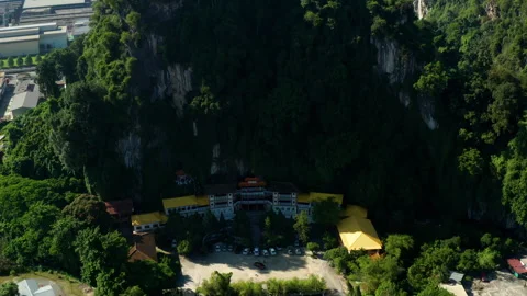 Perak Cave Temple and limestone hills ae... | Stock Video | Pond5