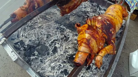 Perfect Whole Roasted Pig on a Spit | Stock Video | Pond5