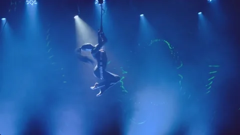 Performance of an aerial gymnast with a ... | Stock Video | Pond5