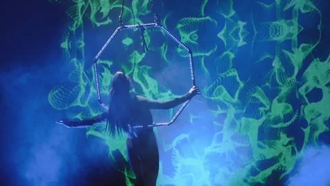 Performance of an aerial gymnast with a ... | Stock Video | Pond5