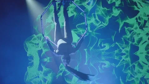 Performance of an aerial gymnast with a ... | Stock Video | Pond5