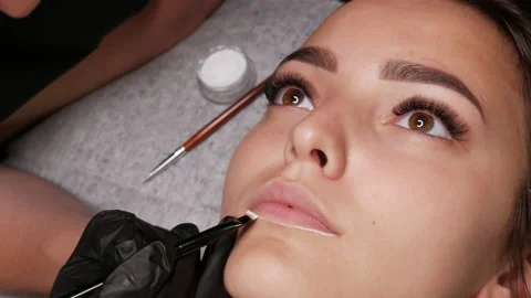 Permanent makeup artist microblading wit... | Stock Video | Pond5