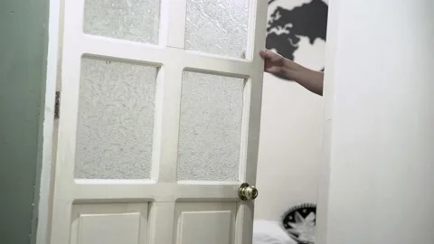 Person closing the bedroom door | Stock Video | Pond5