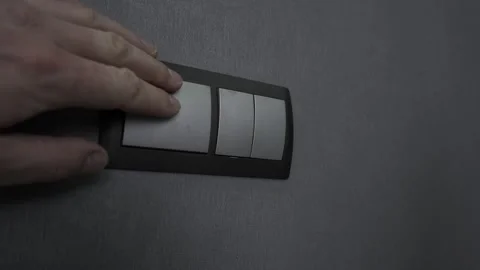 Person finger press light switch off but... | Stock Video | Pond5