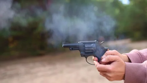 Revolver Smoke Stock Videos – Royalty-Free HD & 4K Videos | Pond5
