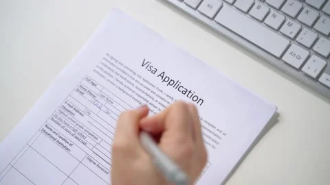 Person Hand Filling Visa Application For... | Stock Video | Pond5