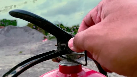 Person hands removing safety pin from fi... | Stock Video | Pond5