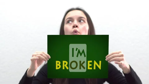 Person holding I am broken sign. Concept... | Stock Video | Pond5