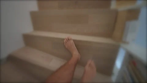 Person legs POV going down the stairs. C... | Stock Video | Pond5