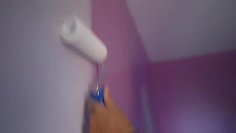 Person painting wall. First paint in new... | Stock Video | Pond5